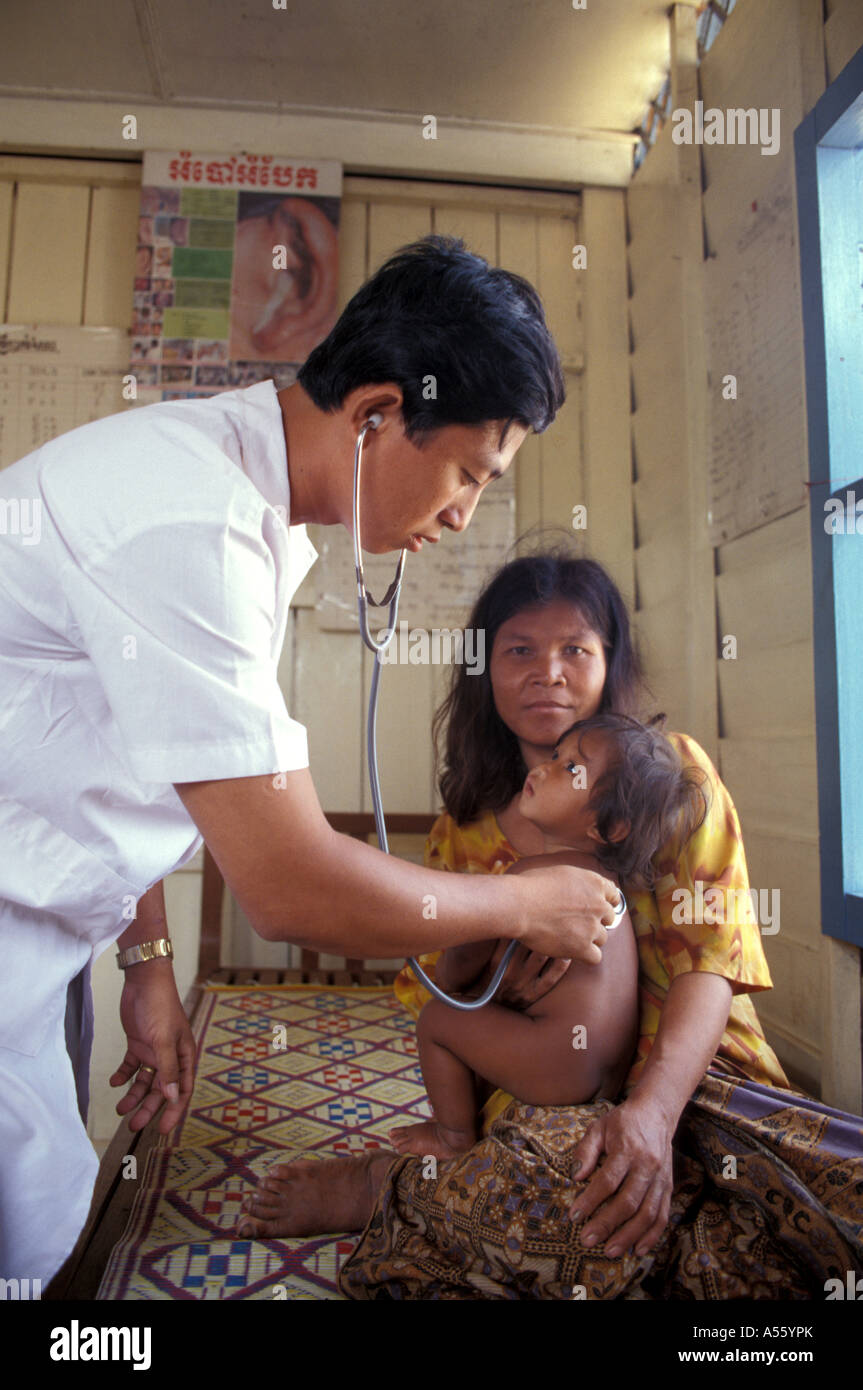 Painet ix1828 cambodia doctor examining child floating clinic tonle sap lake siem reap country ...