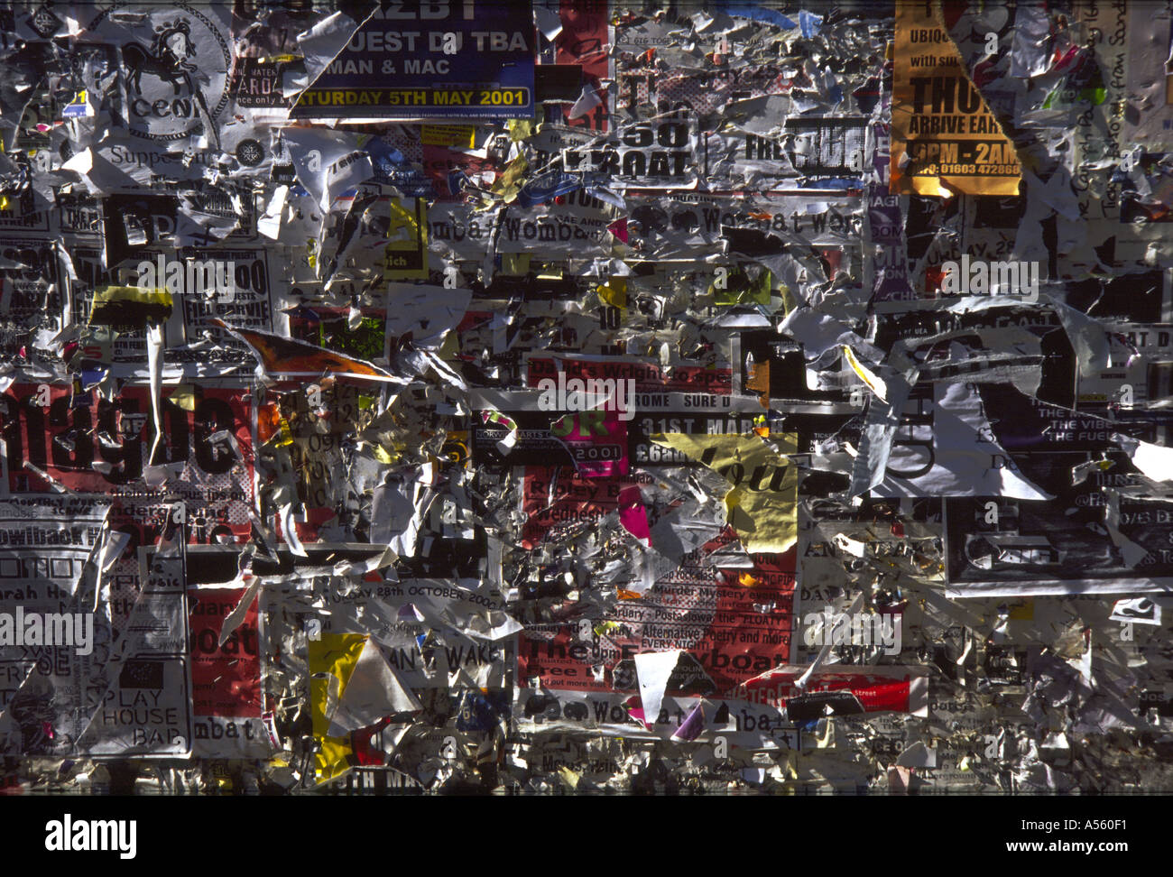 Torn Posters on Billboard Stock Photo - Alamy