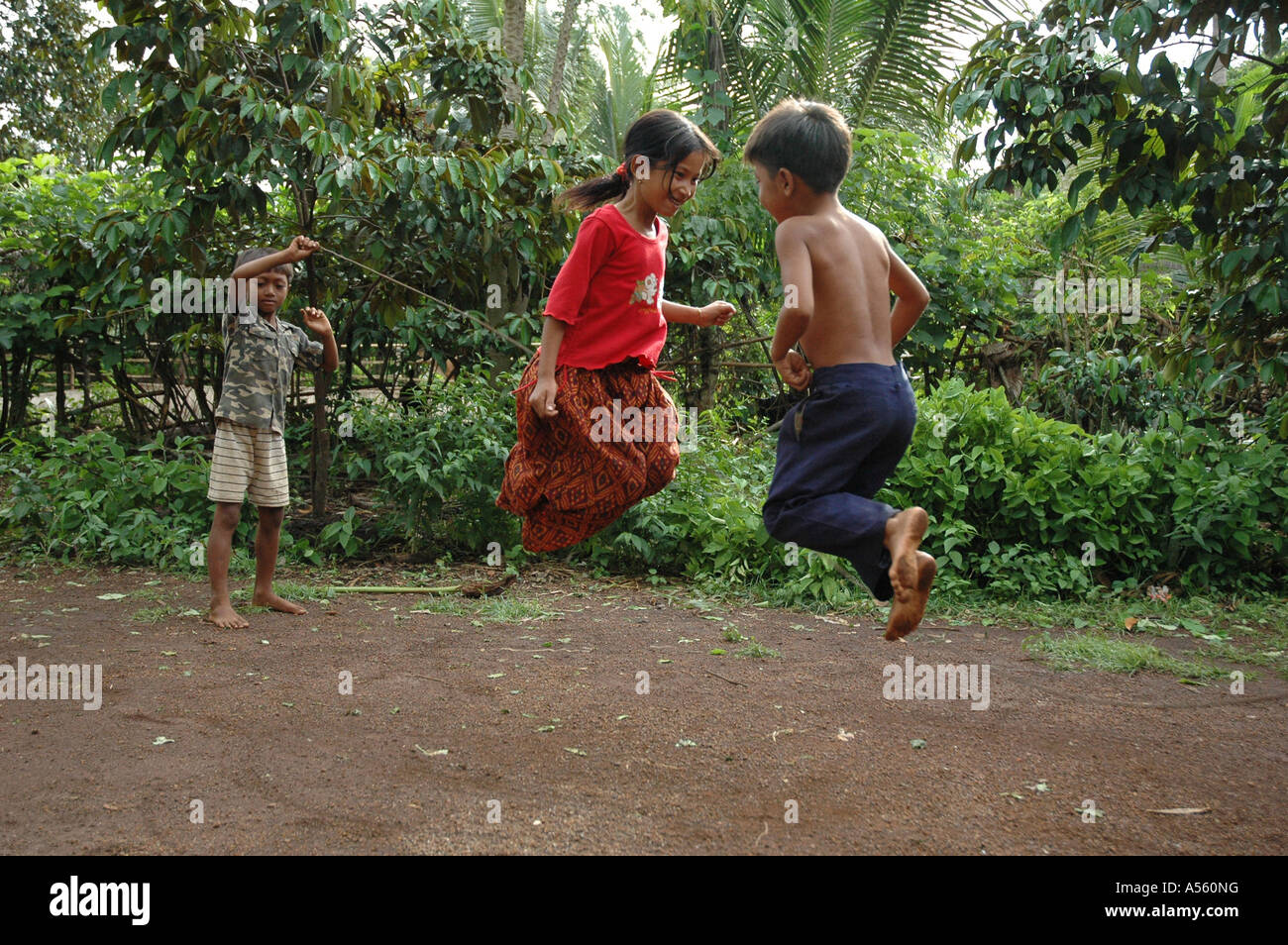 Painet ix1908 cambodia children skipping kampong cham country ...