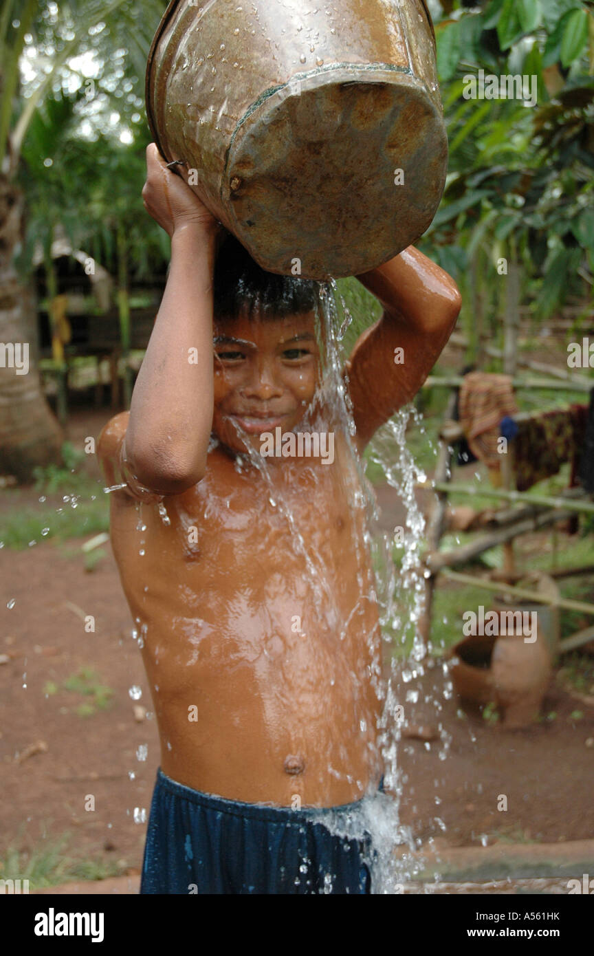 Painet ix1947 cambodia boy taking bath kampong cham country developing ...