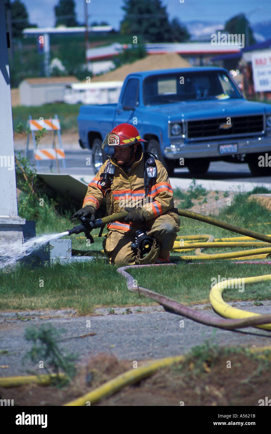 Firemen training for fighting fires Stock Photo - Alamy