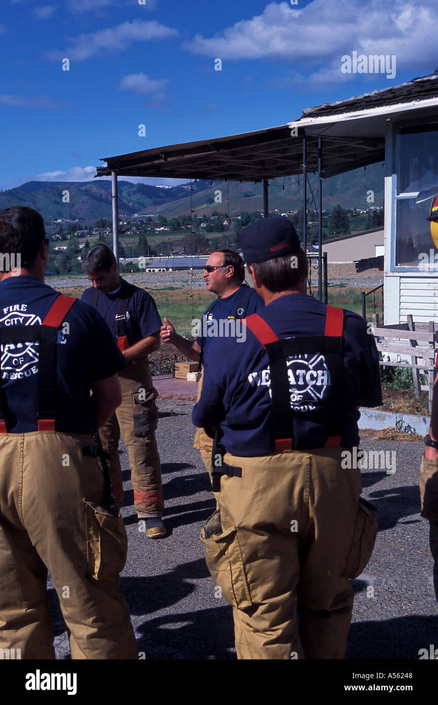 Firemen at fire training exercise for editorial Stock Photo - Alamy