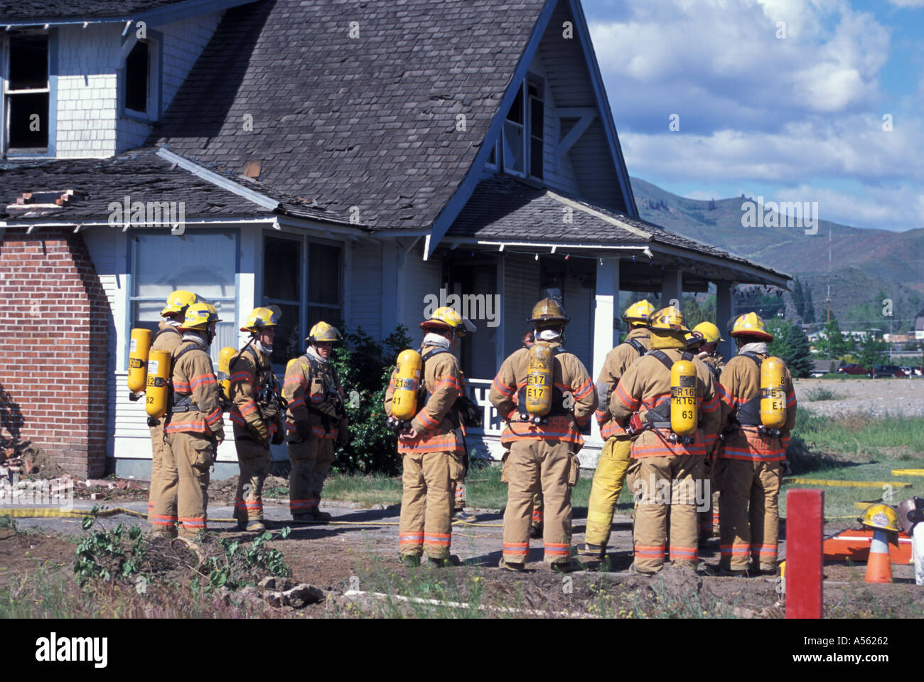 Firemen at fire training exercise for editorial Stock Photo - Alamy