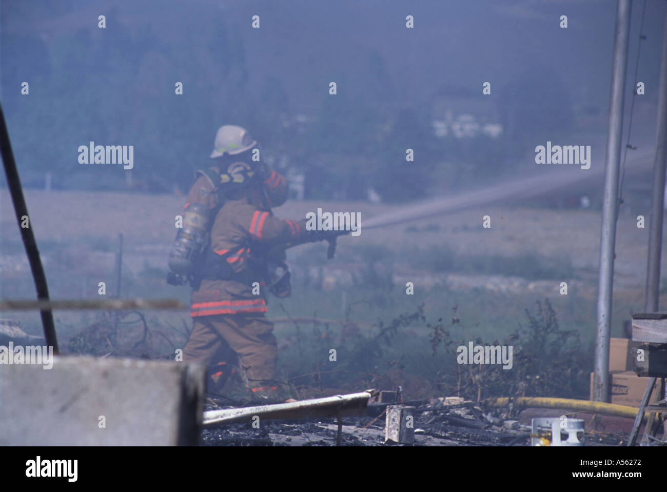 Firemen at fire training exercise for editorial Stock Photo - Alamy