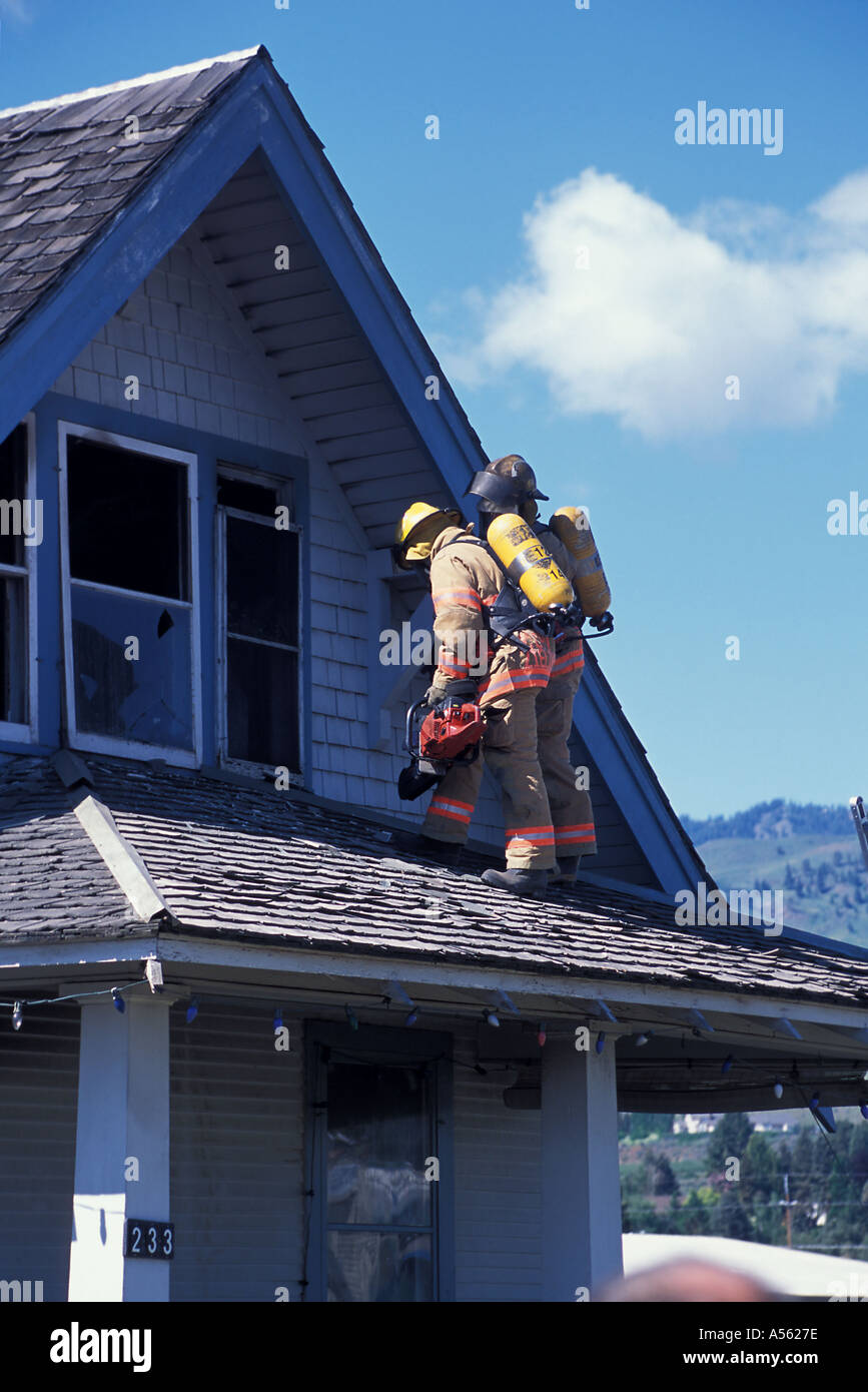 Firemen at fire training exercise for editorial Stock Photo - Alamy