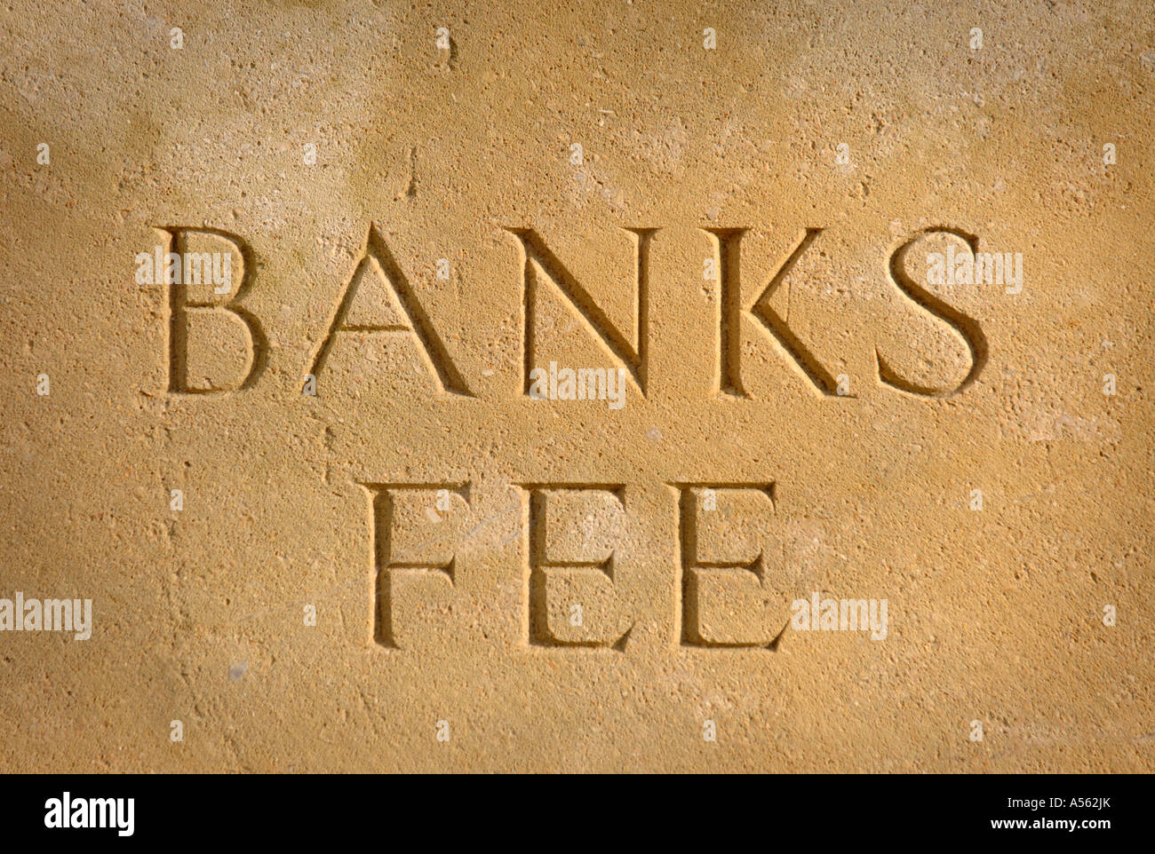 THE INSCRIPTION BANKS FEE CARVED INTO A STONE Stock Photo - Alamy