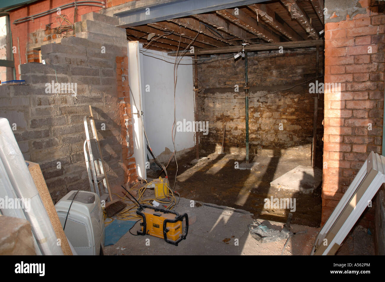 BUILDING WORK ALLOWING THE ENLARGEMENT OF A WALL OPENING INTO A ...