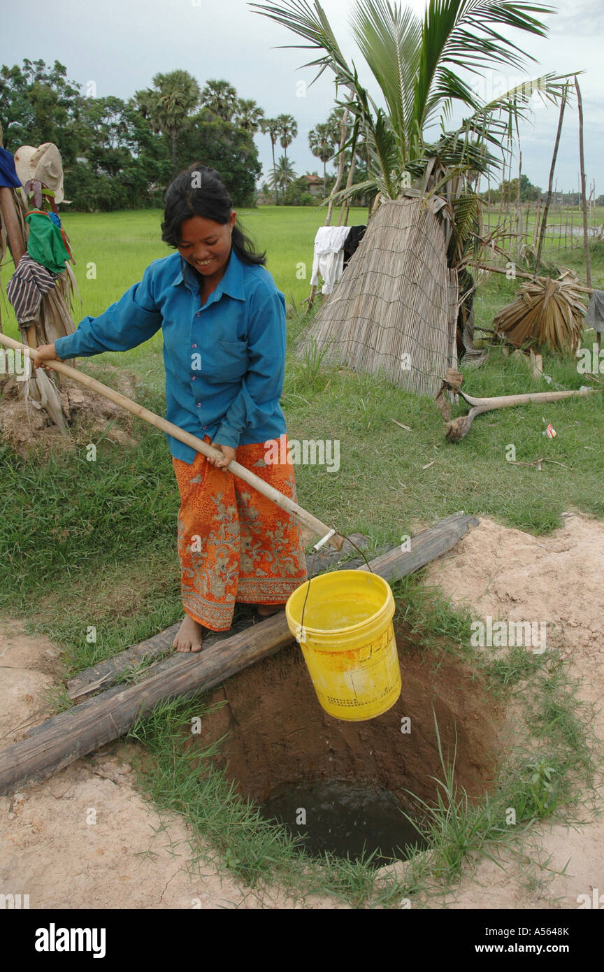 Painet ix2115 cambodia woman drawing water well kampong cham country ...