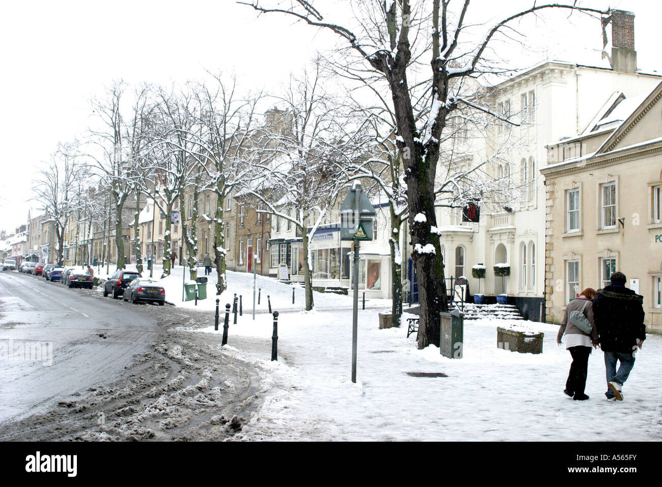 People walking in the snow in Witney Oxfordshire England Stock Photo ...