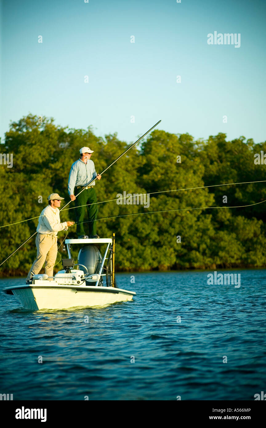 Captain Tom Rowland Casting to Fish Stock Photo - Alamy