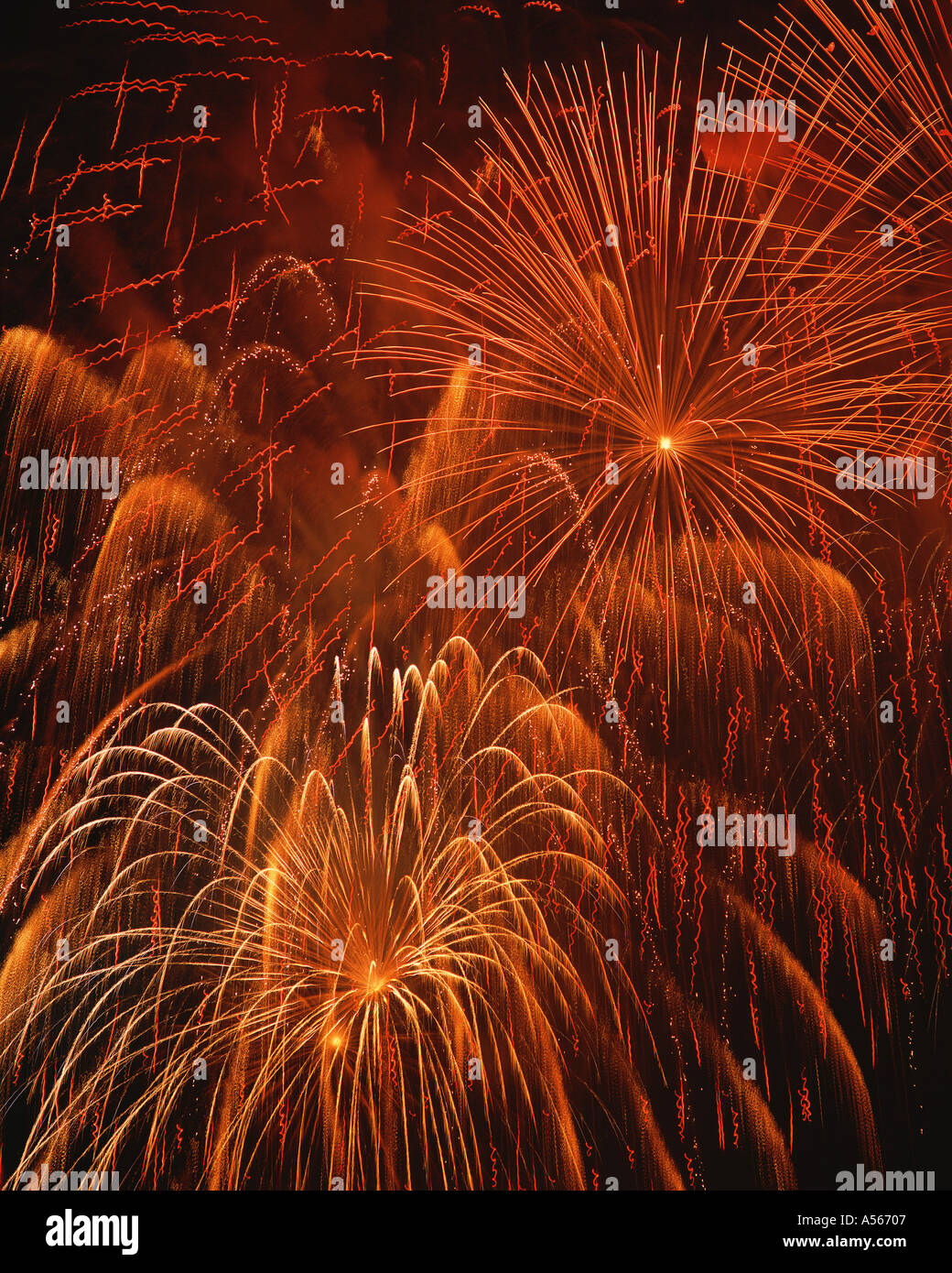 Red fireworks in evening sky Stock Photo - Alamy