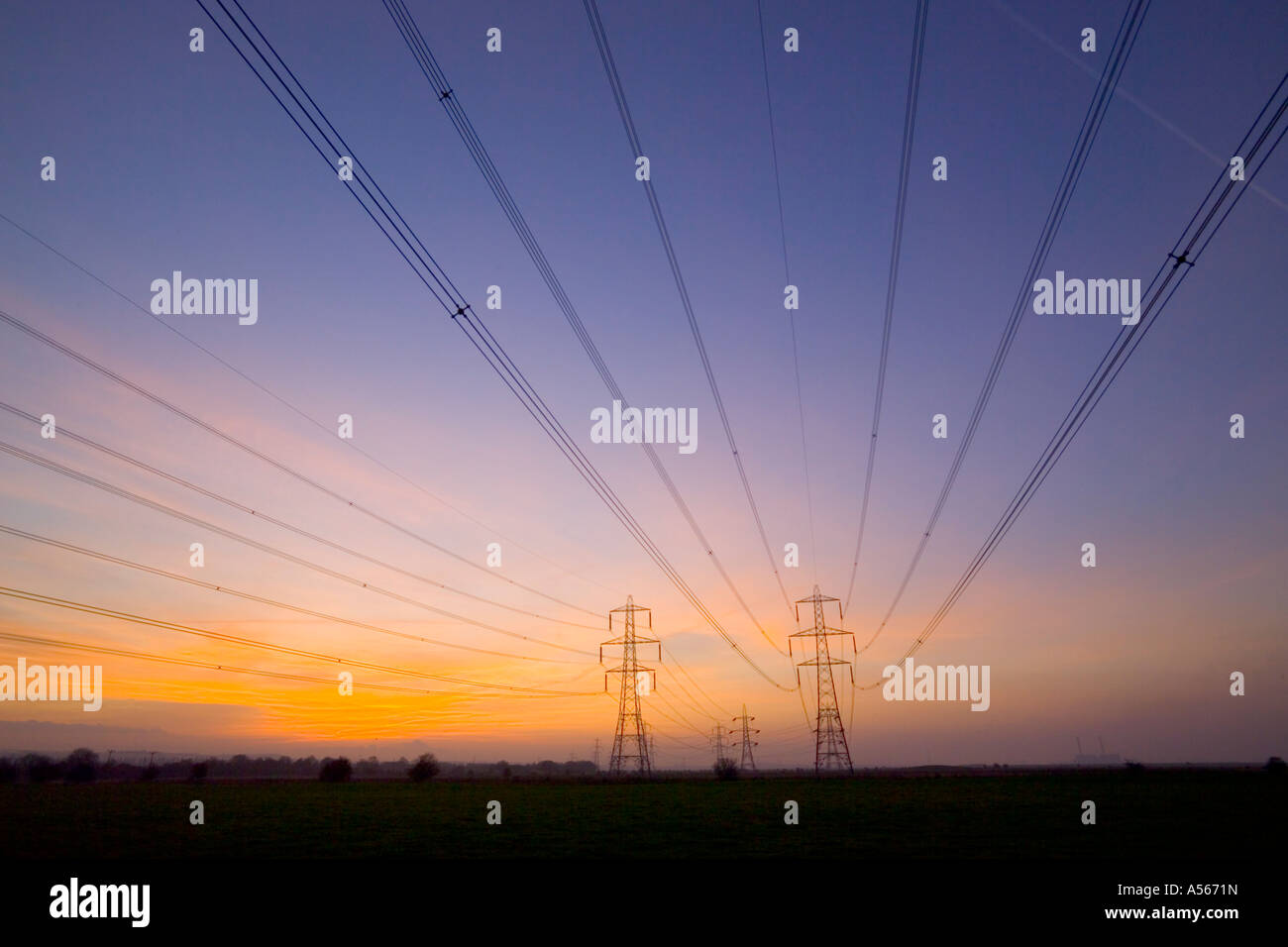 Power lines at sunset Stock Photo - Alamy