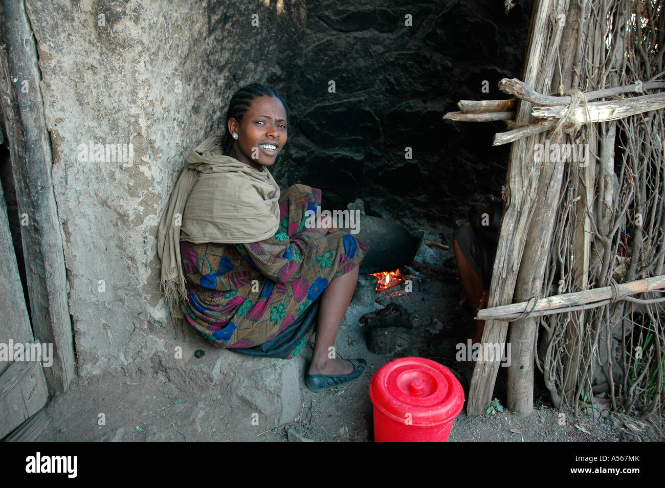 Painet iy7843 ethiopia woman cooking wood fire bilbala village lalibela ...