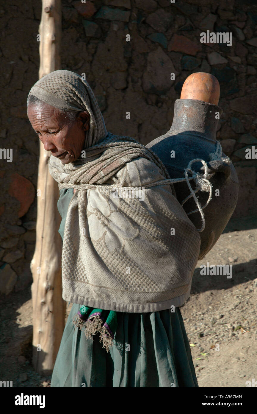 Painet iy7845 ethiopia woman carrying water bilbala village lalibela ...