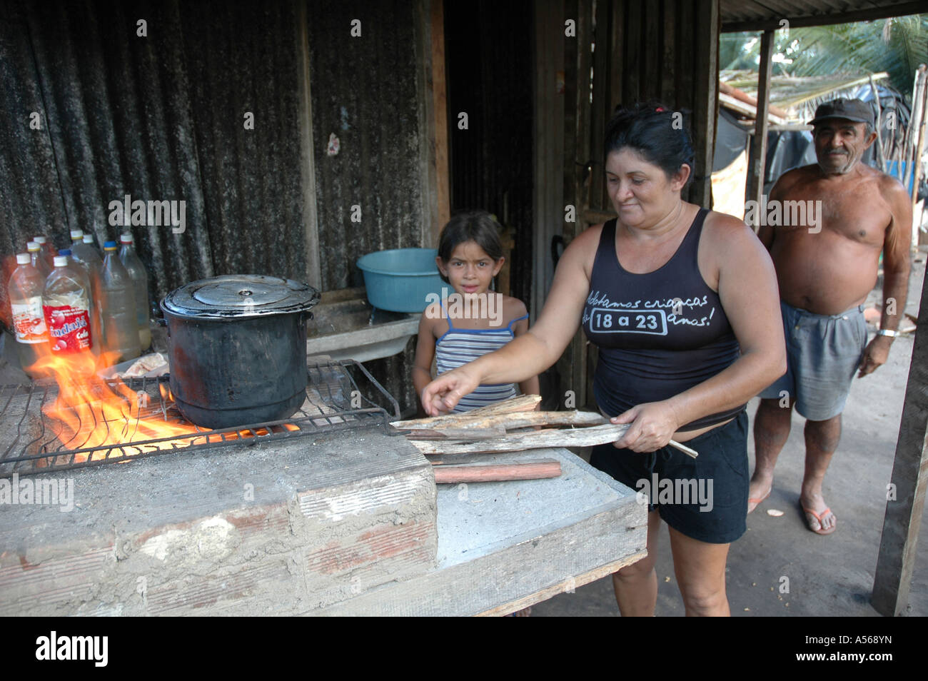 iy7998 brazil woman cooking wood fire pinicha mombaba squatter ...
