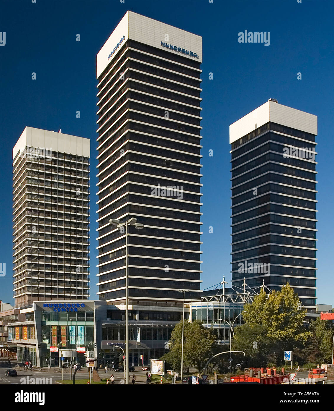 Towers of Mundsburg Center in Hamburg rise into the blue sky, Germany ...