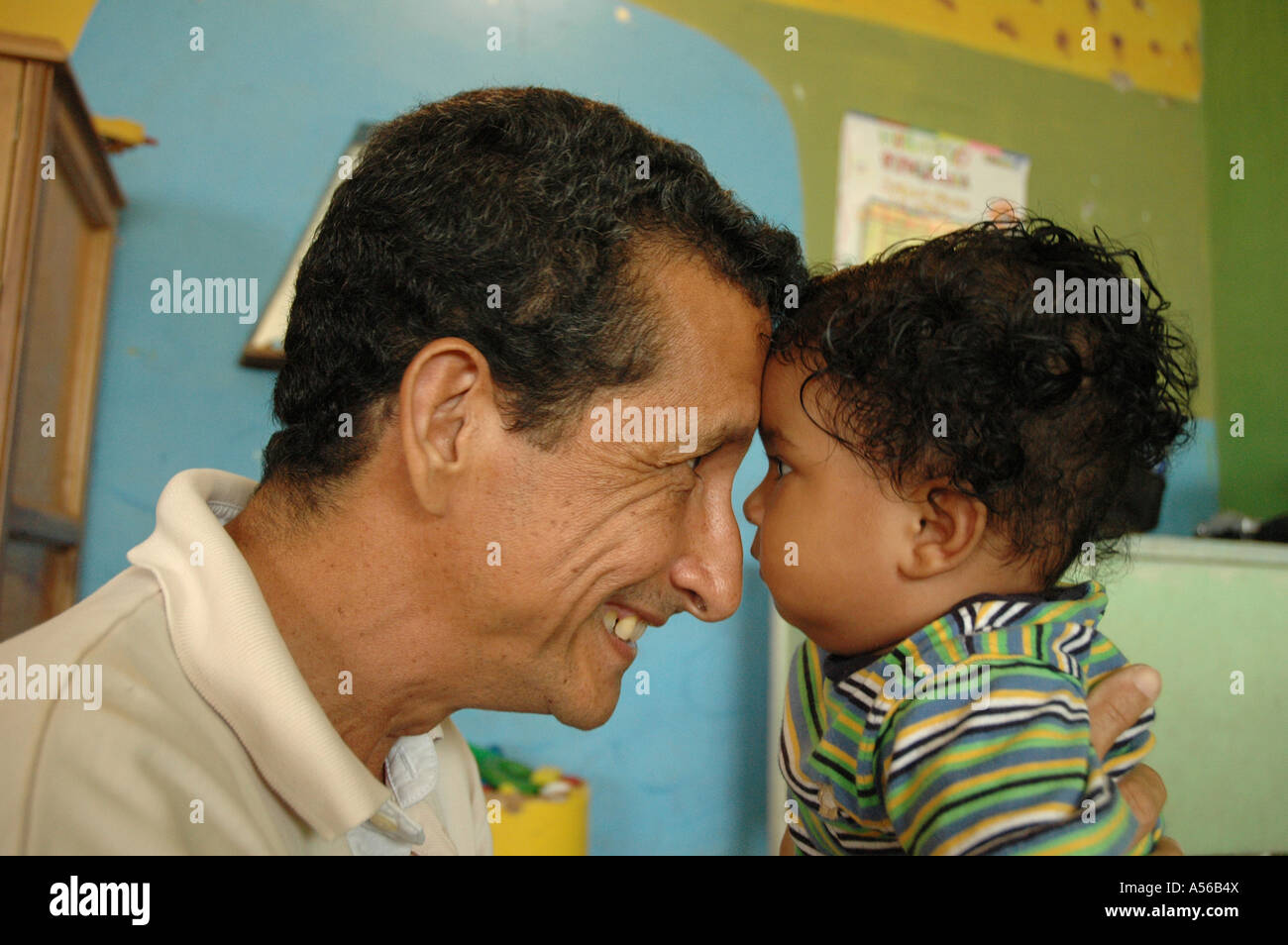 Painet iy8243 colombia father relating nicely son day care child kid ...