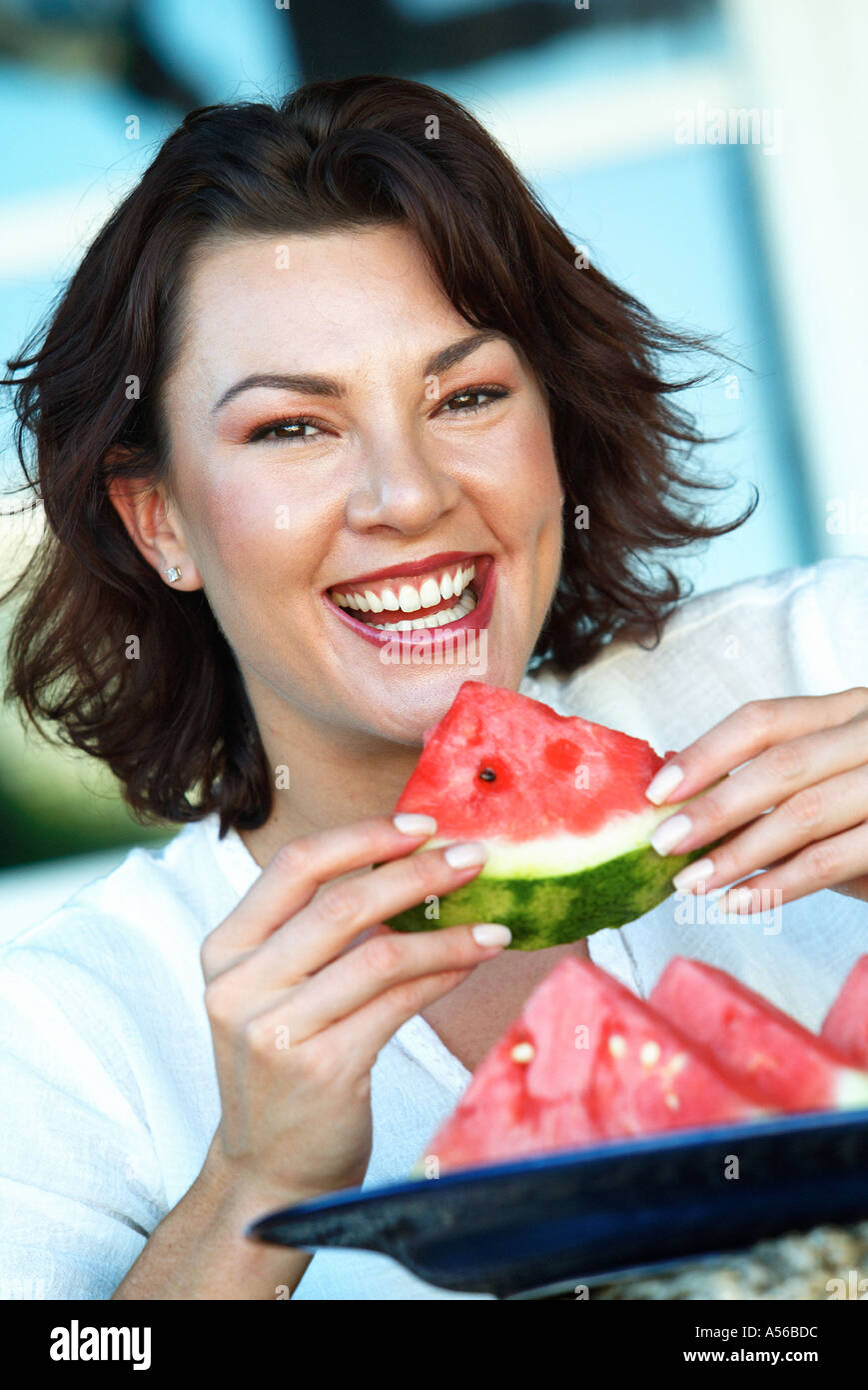 Woman Eating Fruit Stock Photo - Alamy