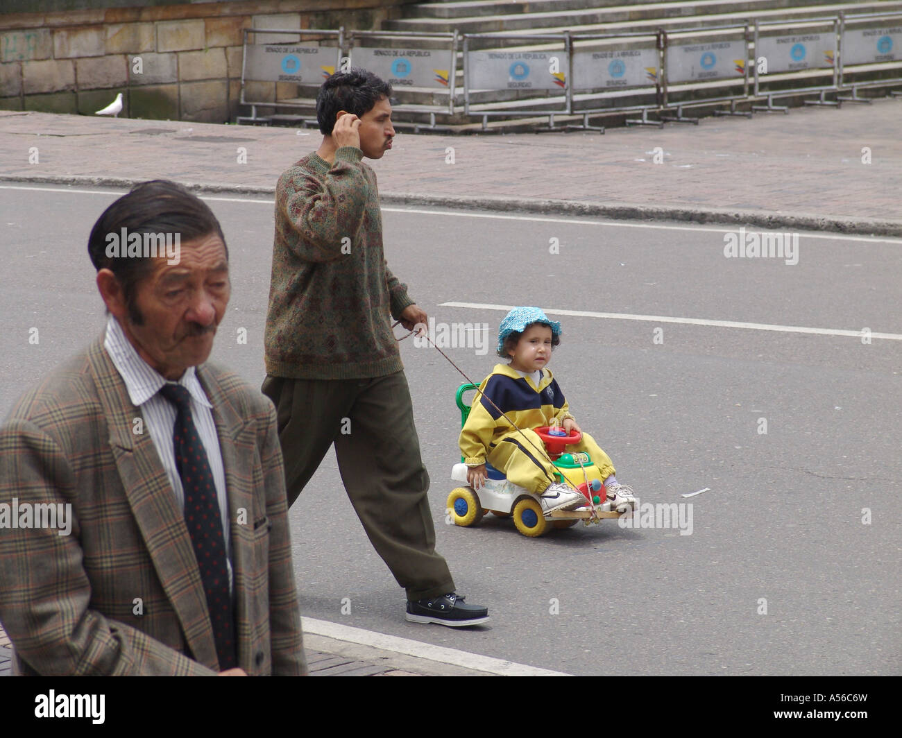 Painet iy8338 boy kid child pulling baby on toy wagon colombia sunday ...