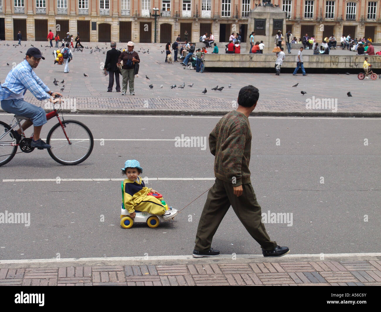 Painet iy8339 boy kid child pulling baby on toy wagon colombia sunday ...