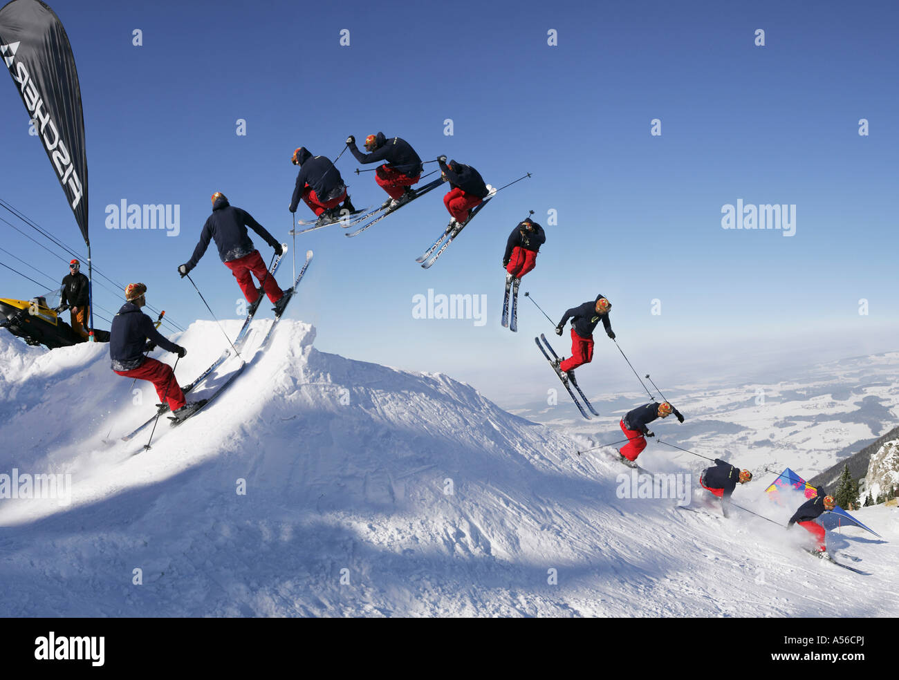 Germany, Bavaria, group of skiers performing jump Stock Photo - Alamy