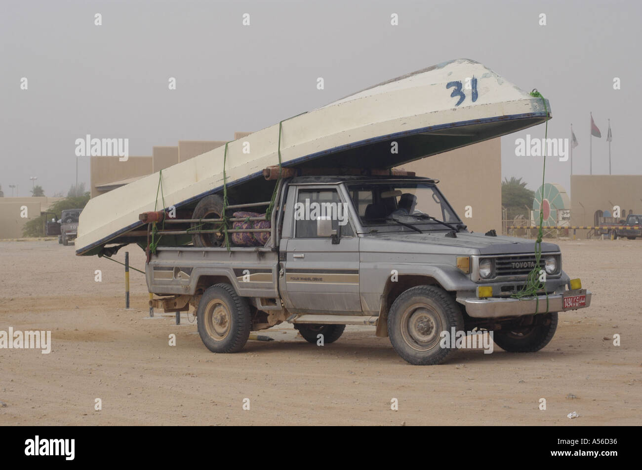 Arab with boat on his truck in Oman Stock Photo - Alamy