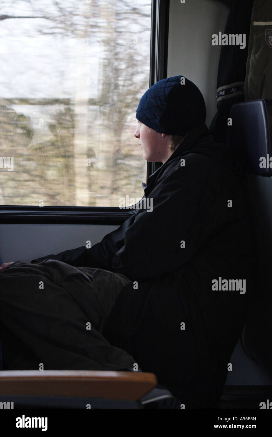 Alone on the Train Stock Photo - Alamy