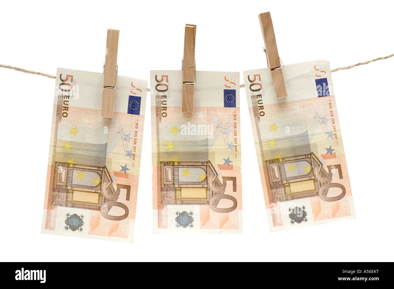 Three fifty Euro banknotes hanging on a clothesline. Isolated on a ...