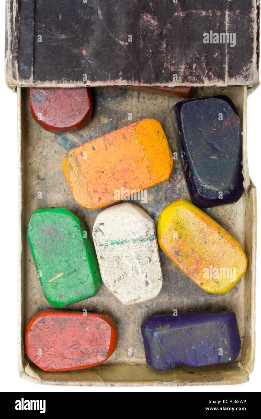 Colorful wax crayons in an old box. Isolated on a white background ...