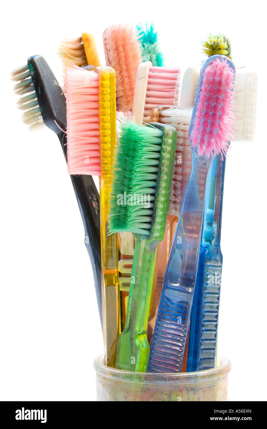 Close view on old toothbrushes used for creative artwork. Isolated on ...
