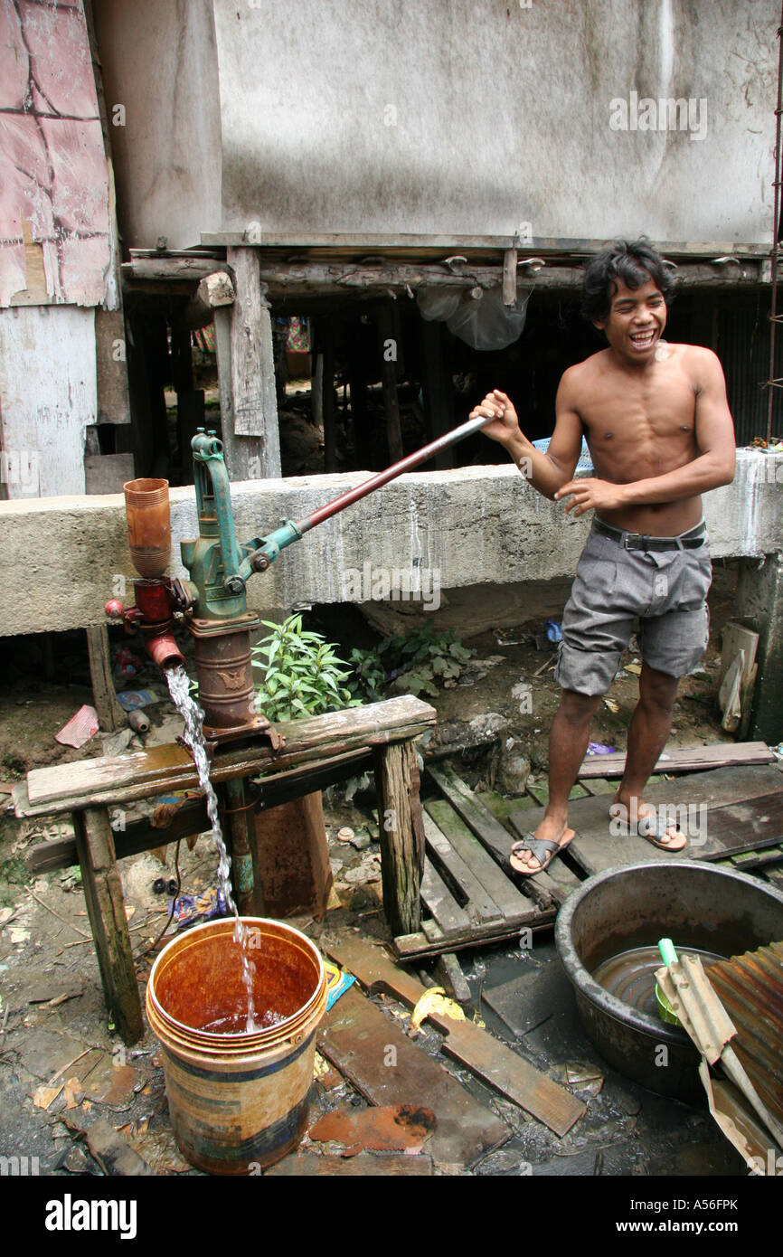 Man Pumping Water High Resolution Stock Photography and Images - Alamy