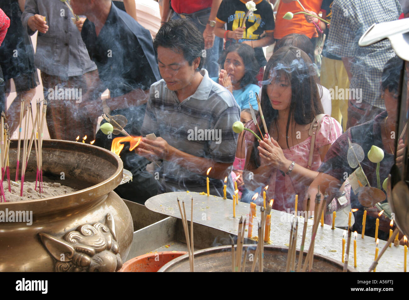 Painet iy8476 thailand devotees praying lighting incense ancient ...