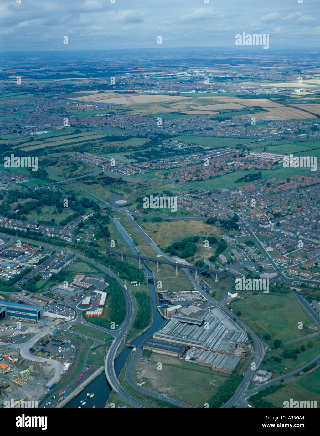 Aerial view showing transport infrastructure, edge of a city, housing ... Aerial view showing transport infrastructure, edge of a city, housing ...