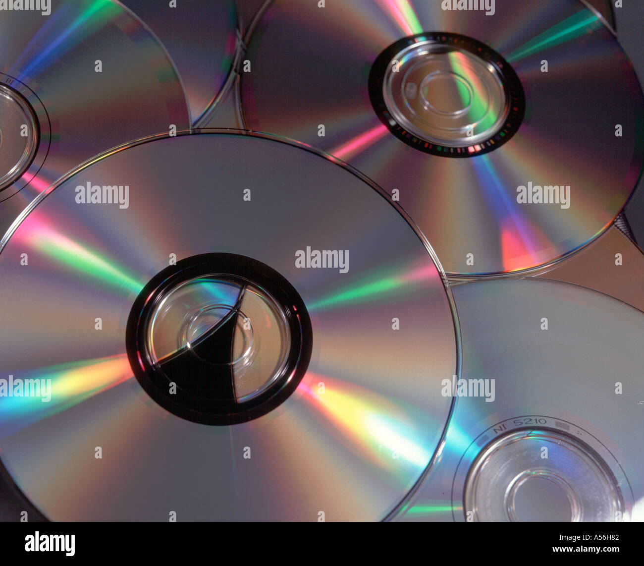 Compact discs with multi coloured reflections Stock Photo - Alamy