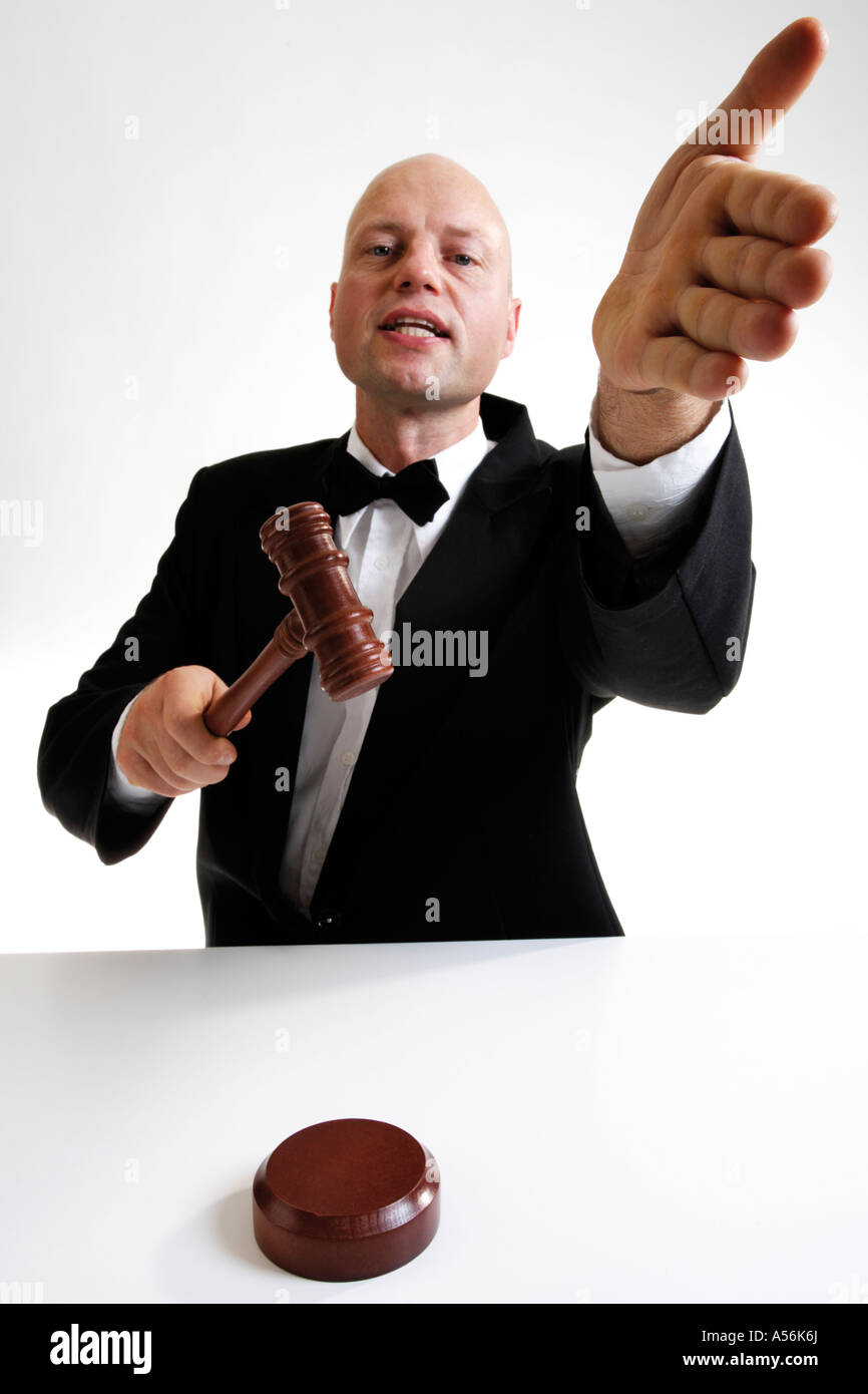 Man with auctioneer´s hammer Stock Photo - Alamy