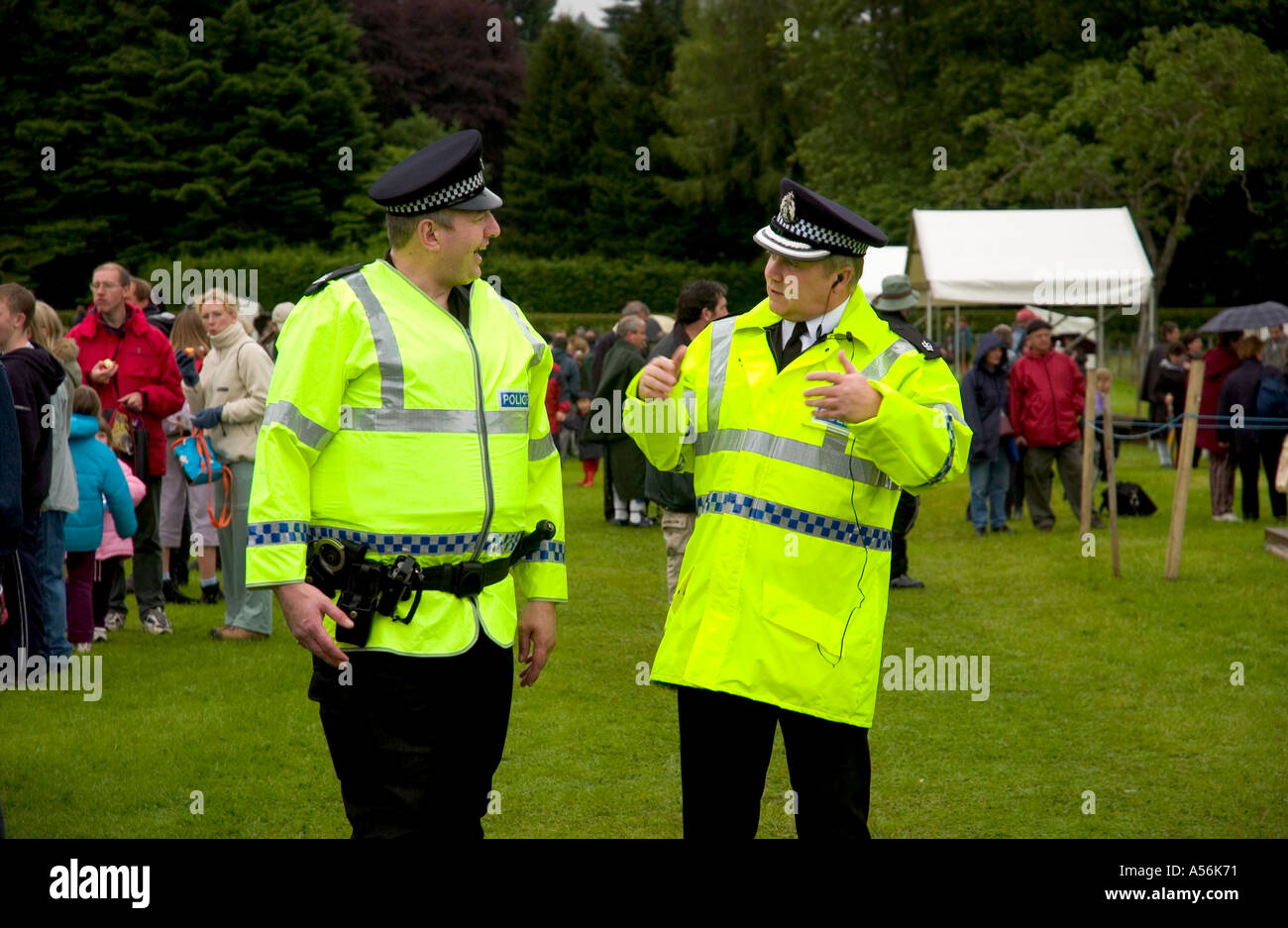 Two policemen at country fair Stock Photo - Alamy
