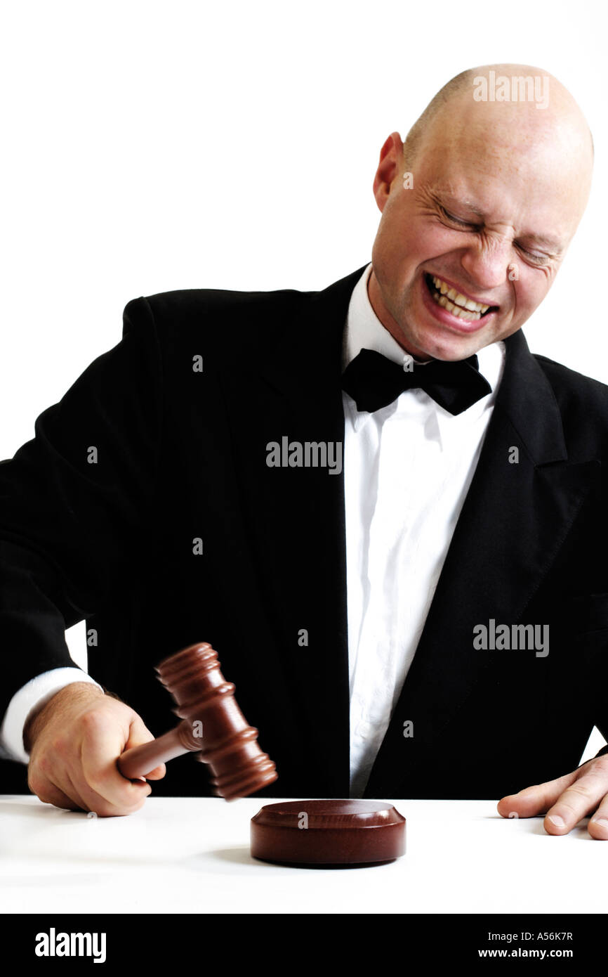 Man with auctioneer´s hammer Stock Photo - Alamy