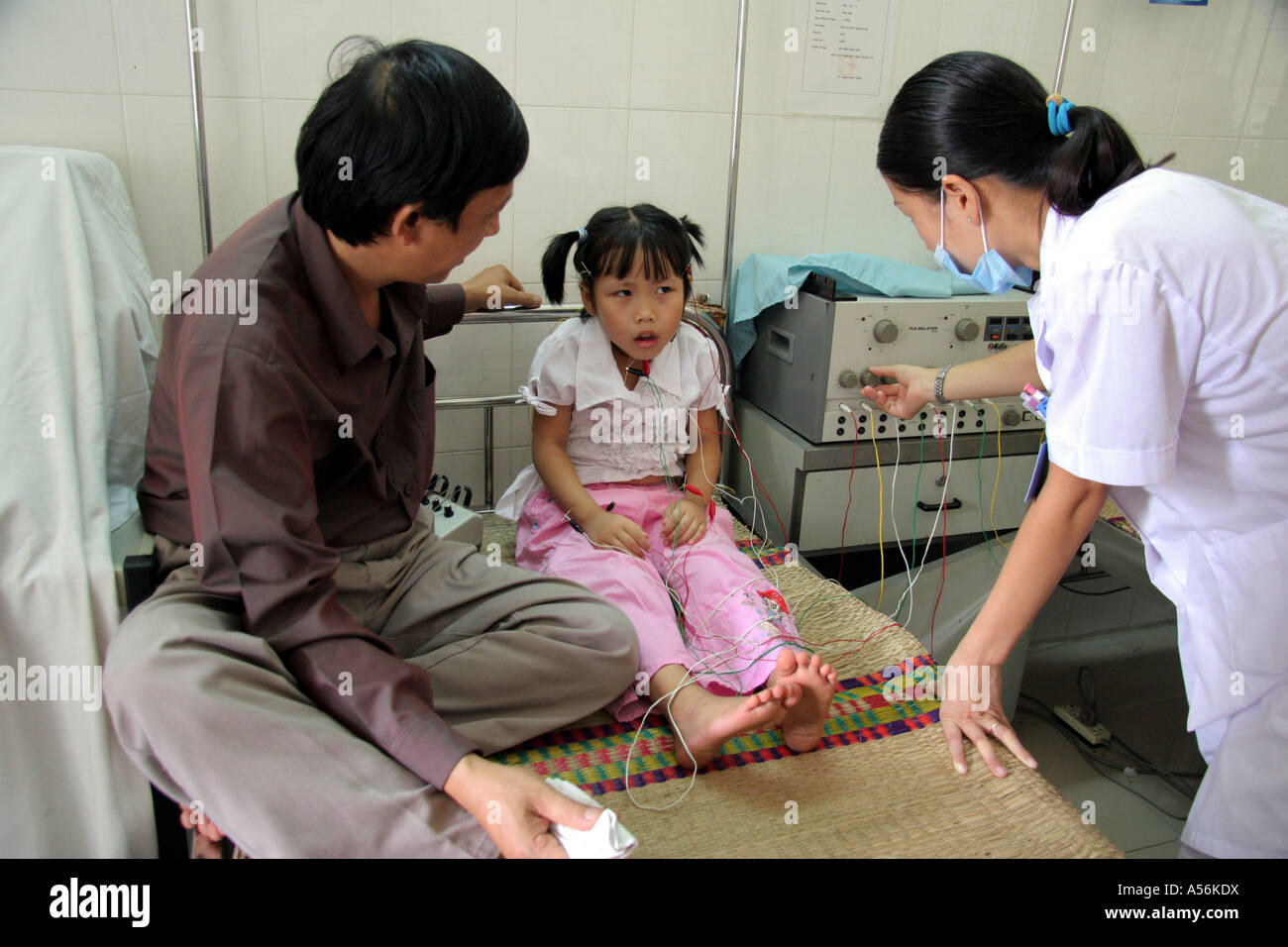 Painet iy8721 vietnam child kid receiving acupuncture treatment ...