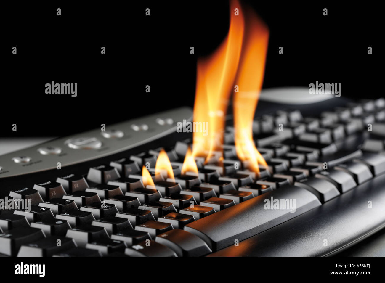 Burning computer keyboard, close-up Stock Photo - Alamy
