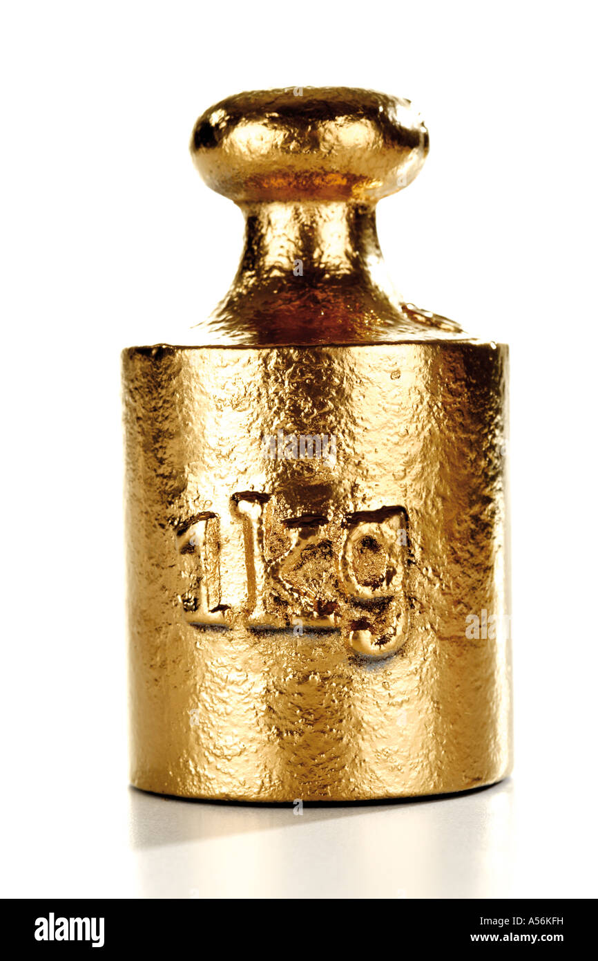 One golden kg weight Stock Photo - Alamy