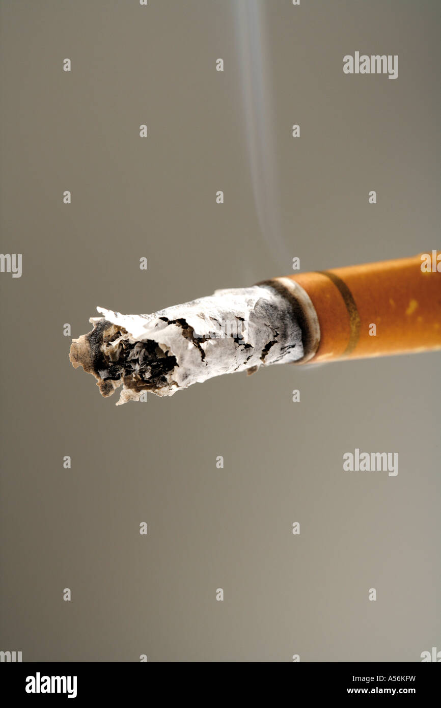 Burning cigarette, close-up Stock Photo - Alamy