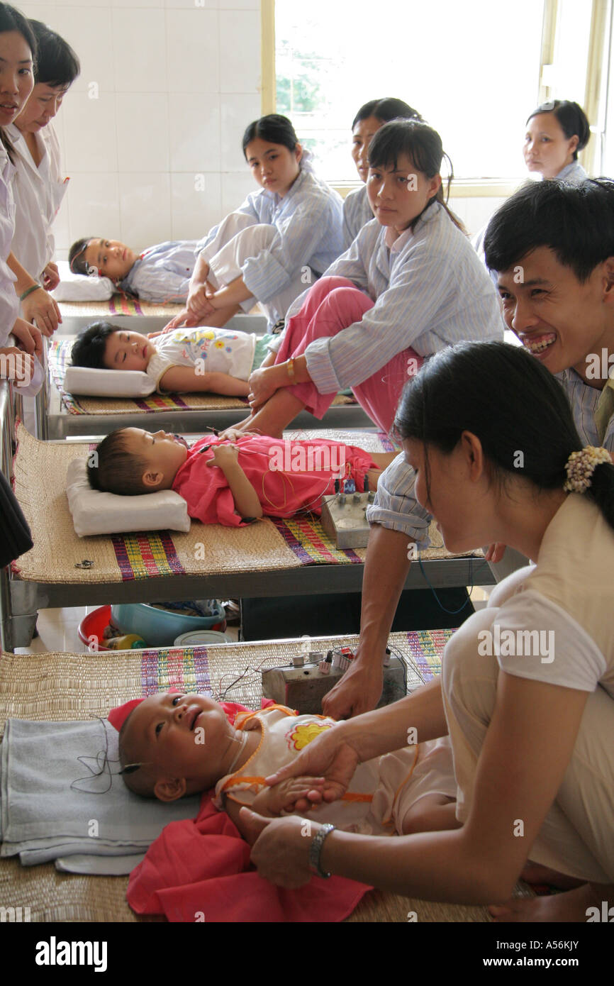 Painet iy8727 vietnam child kid receiving acupuncture treatment ...