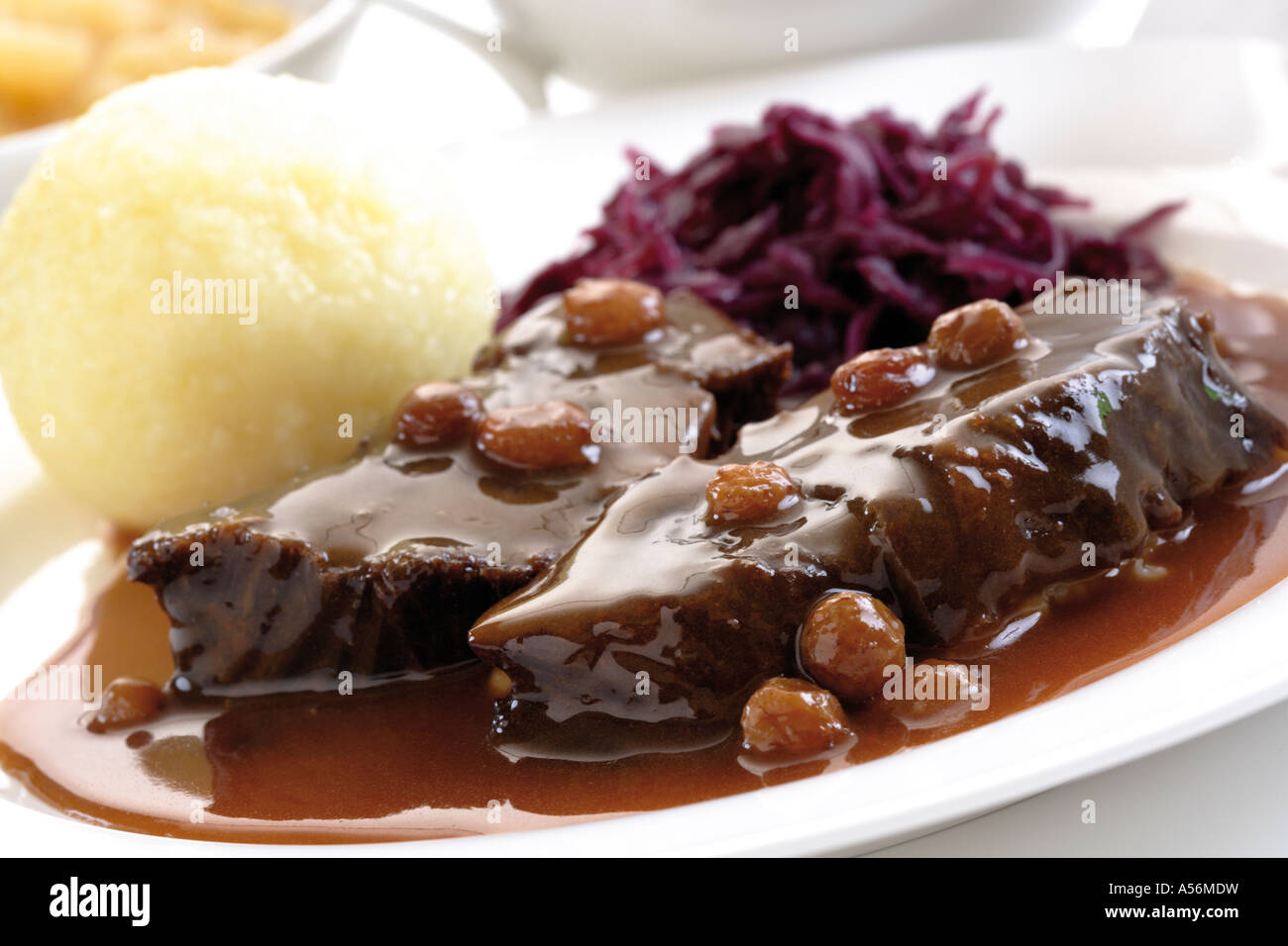 Roast beef with side dishes, tilt view, typical of Rheinland, Germany ...