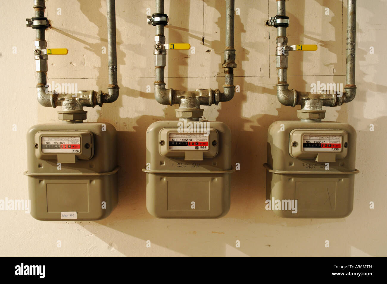 Three gas meters Stock Photo - Alamy