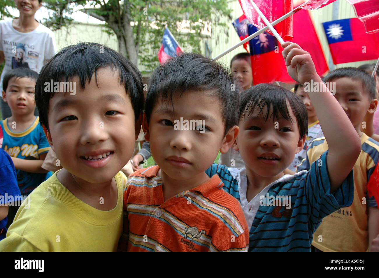 Group of kids culture waving hi-res stock photography and images - Alamy
