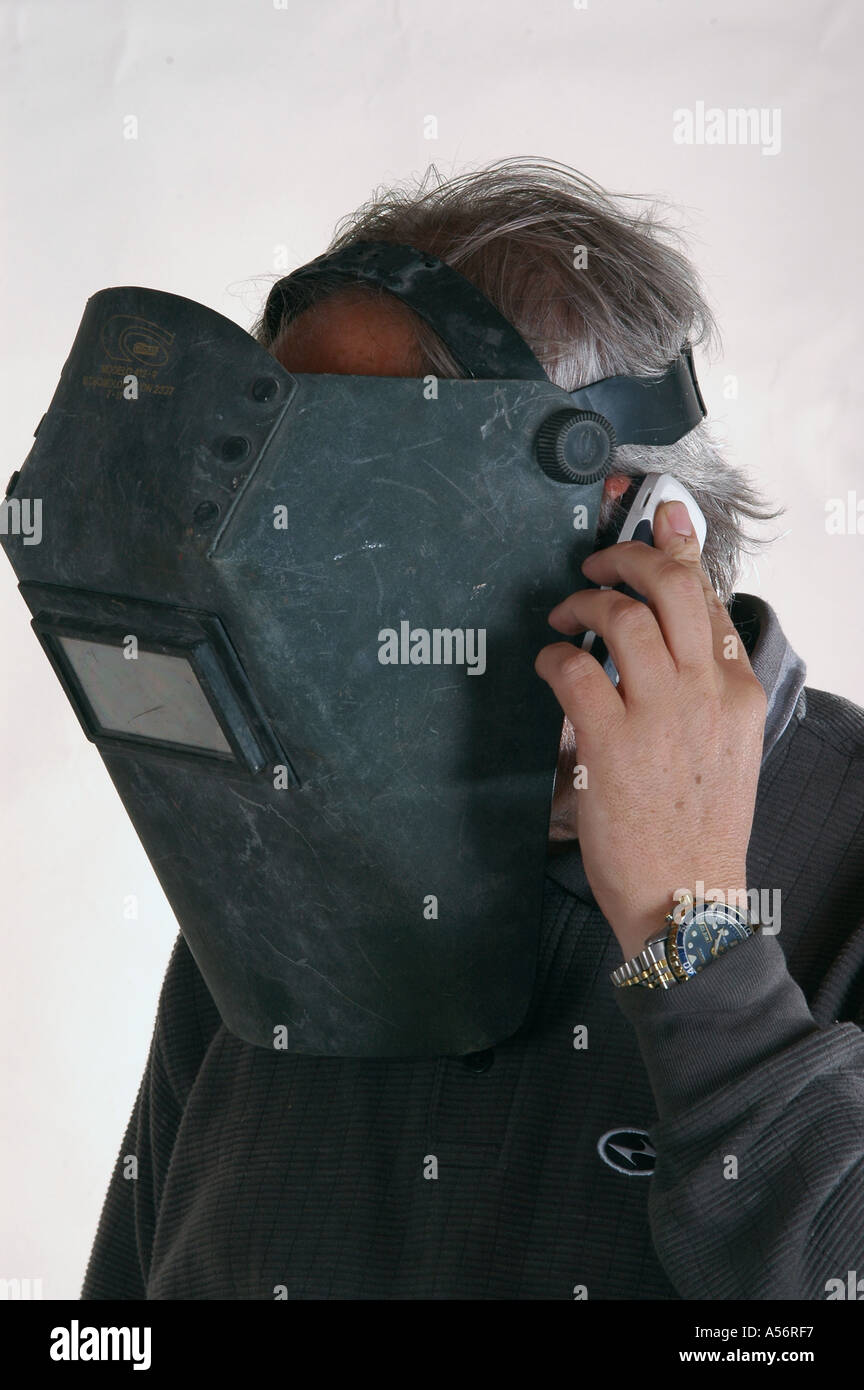 Man wearing welders mask hi-res stock photography and images - Alamy
