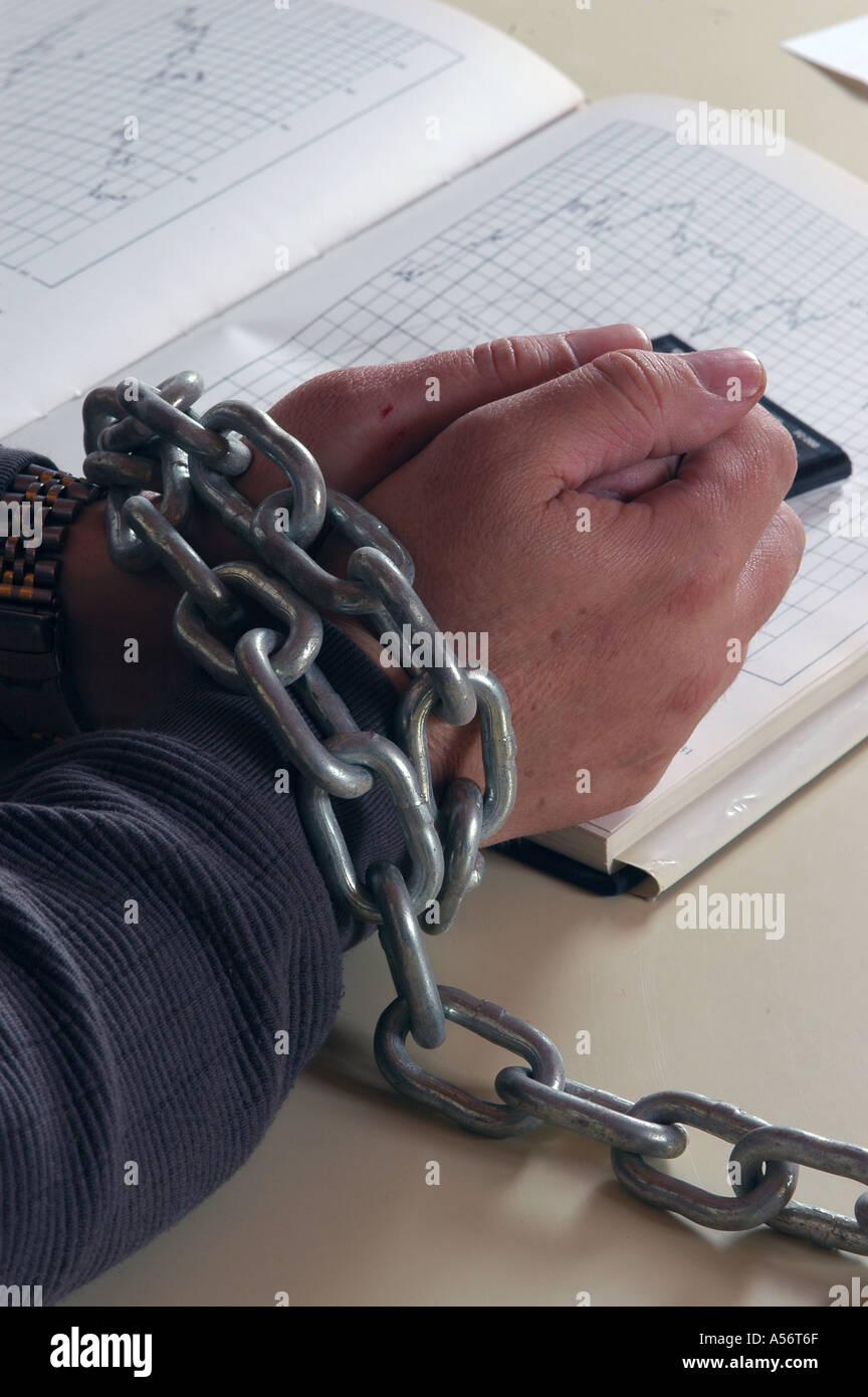 Man in chains Chained hands Stock Photo - Alamy