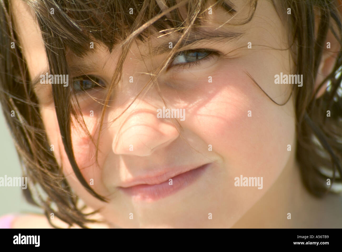 a young girl looking at camera Stock Photo - Alamy