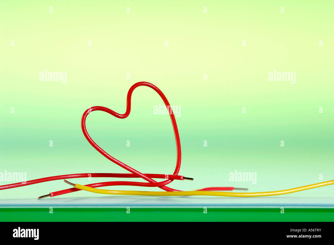 Electrical wires formed as heart, close-up Stock Photo - Alamy