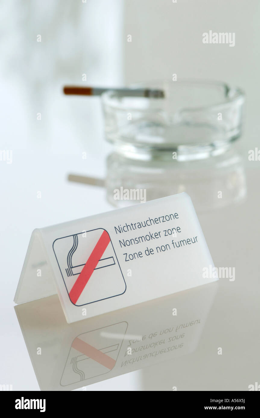 Two cigarettes in ashtray hi-res stock photography and images - Alamy